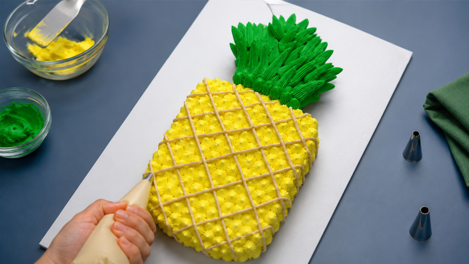 Pineapple cake gets a bright tropical finish