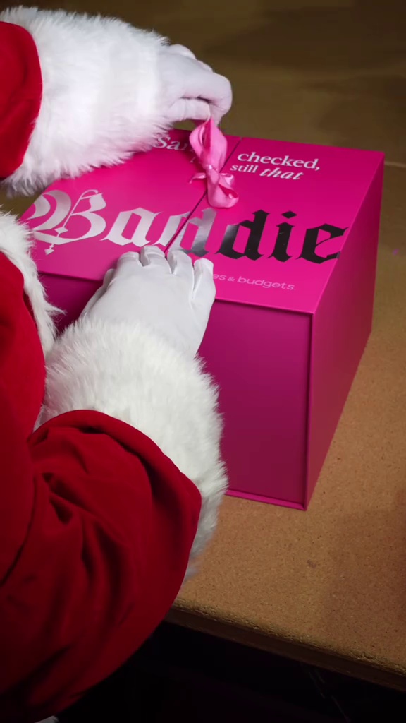 Santa packs the ultimate pink baddie holiday gift box