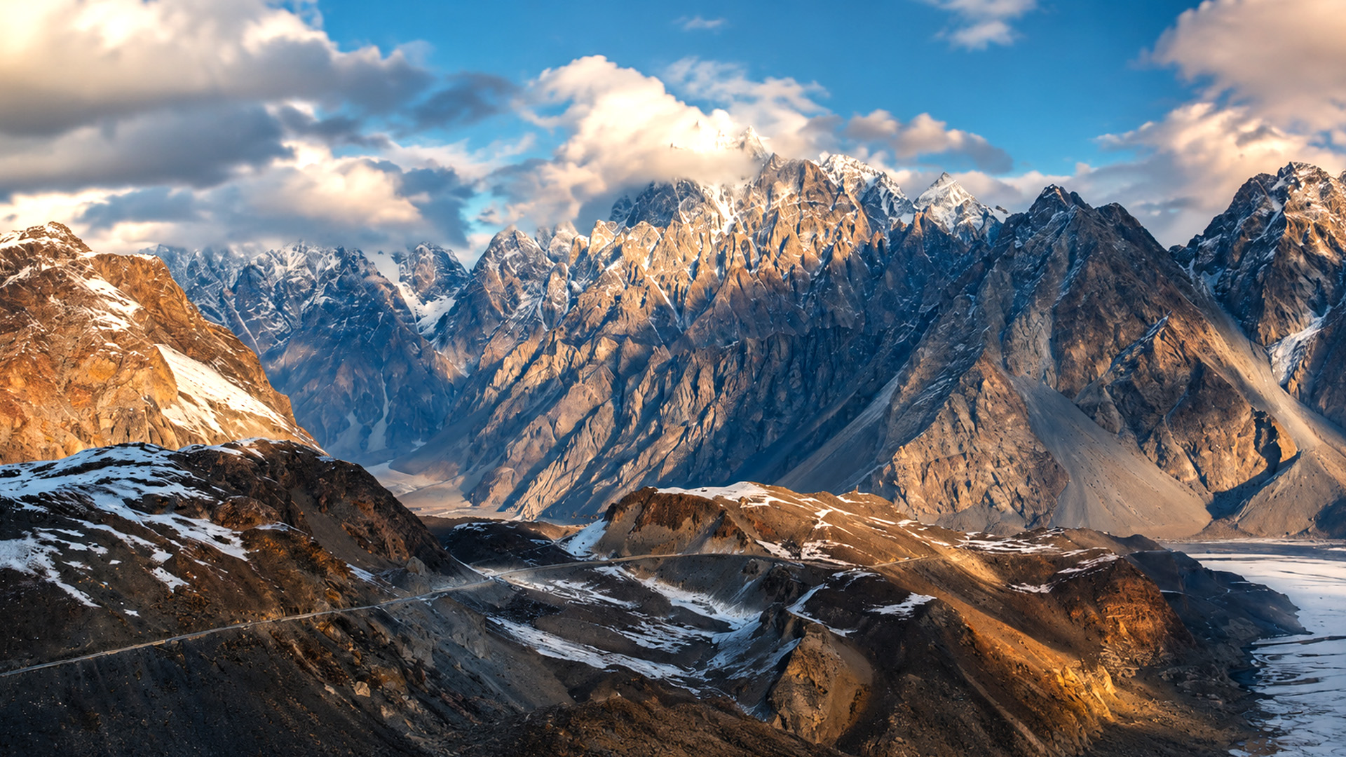 Passu cones rising above snowy Karakoram peaks