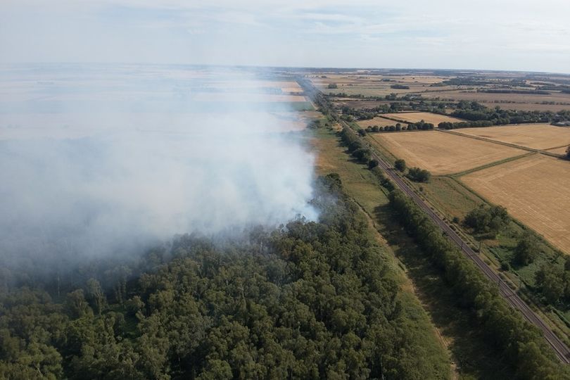 'Avoid area' amid ongoing nature reserve fire as fire crews issue smoke ...