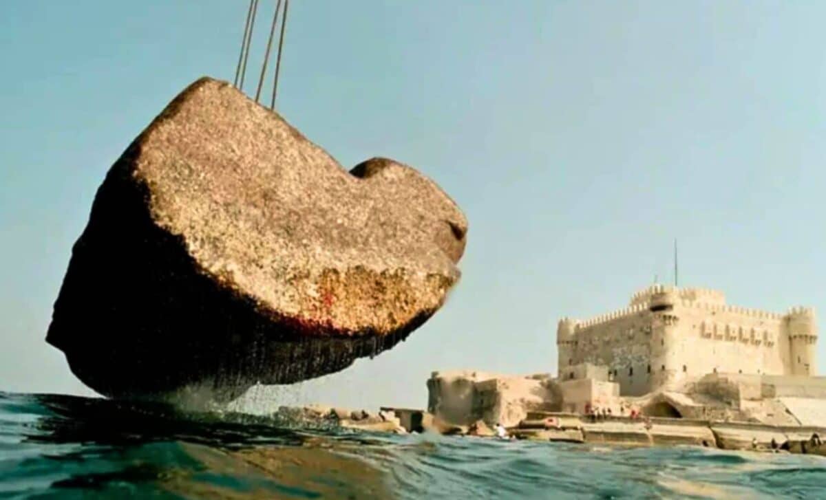 Archaeologists lift 80-ton stones from the sea, believed to be part of ...