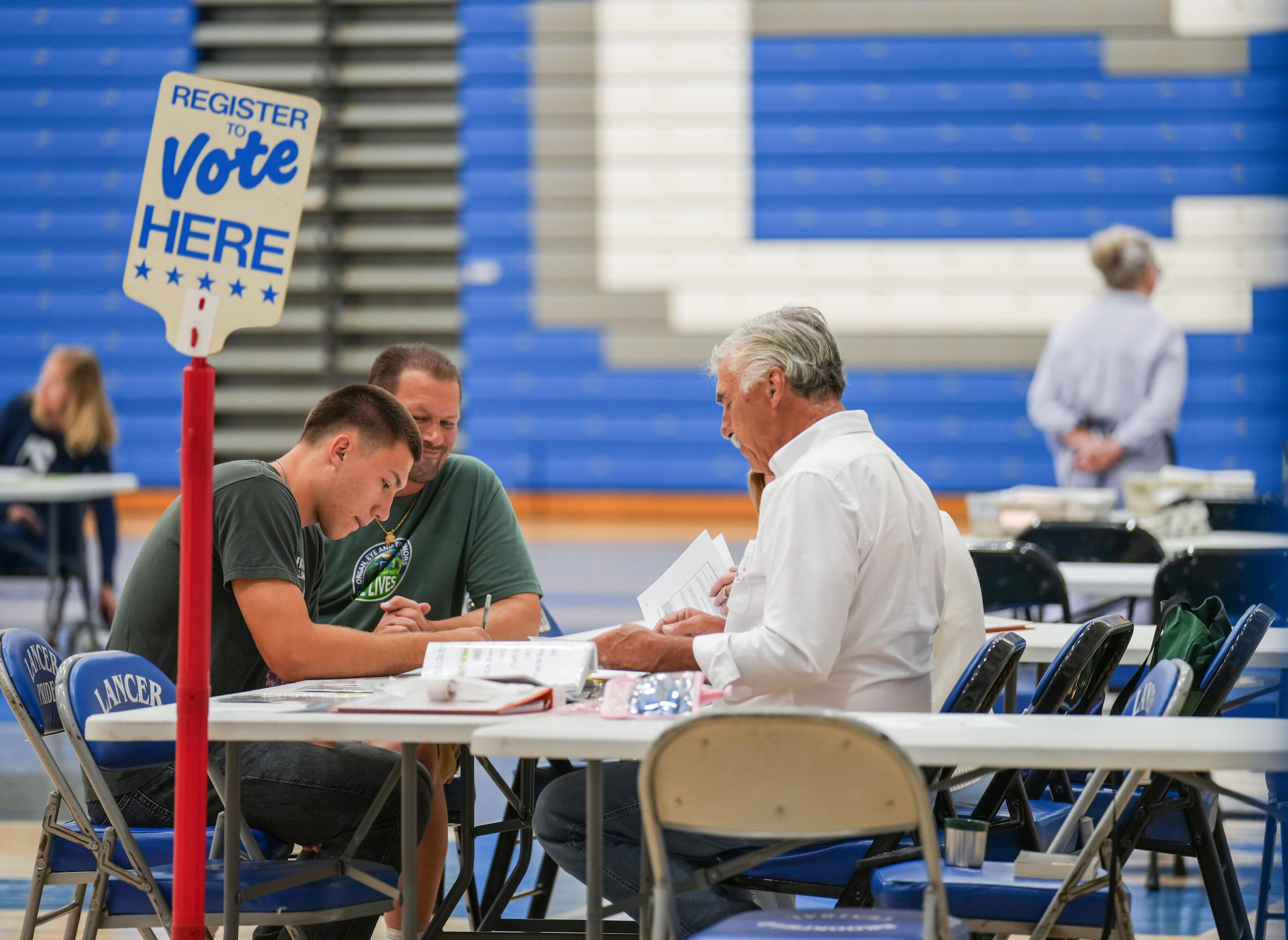 Is a Wisconsin ballot disqualified if a poll worker writes on it?