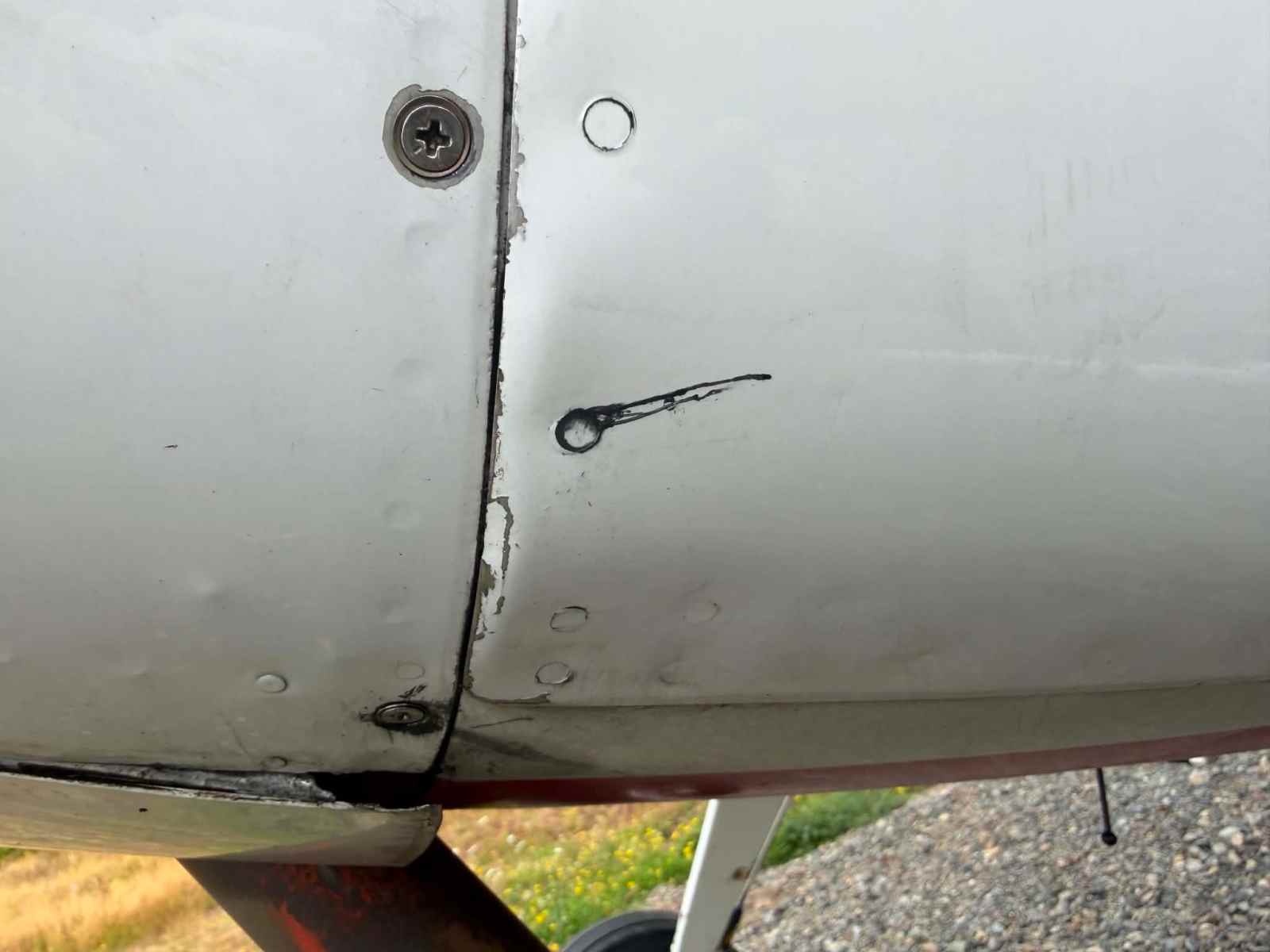Are those 'smoking rivets' on an airplane a safety risk?