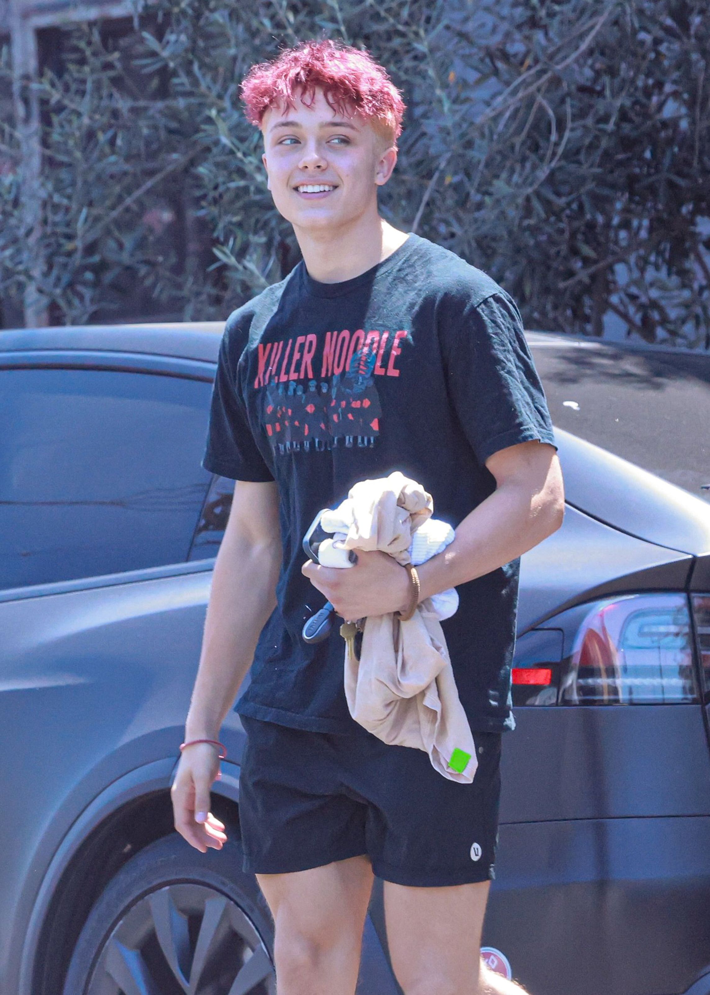 Knox Léon Jolie steps out with a new bright red hair color