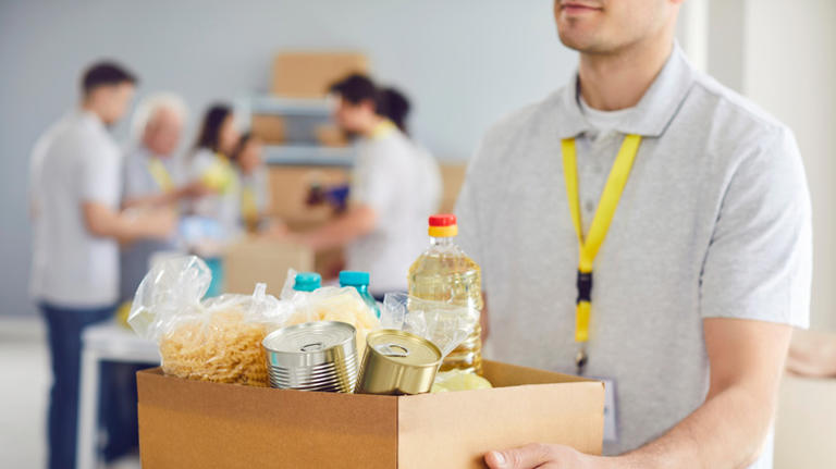 What does Aldi do with unsold food?