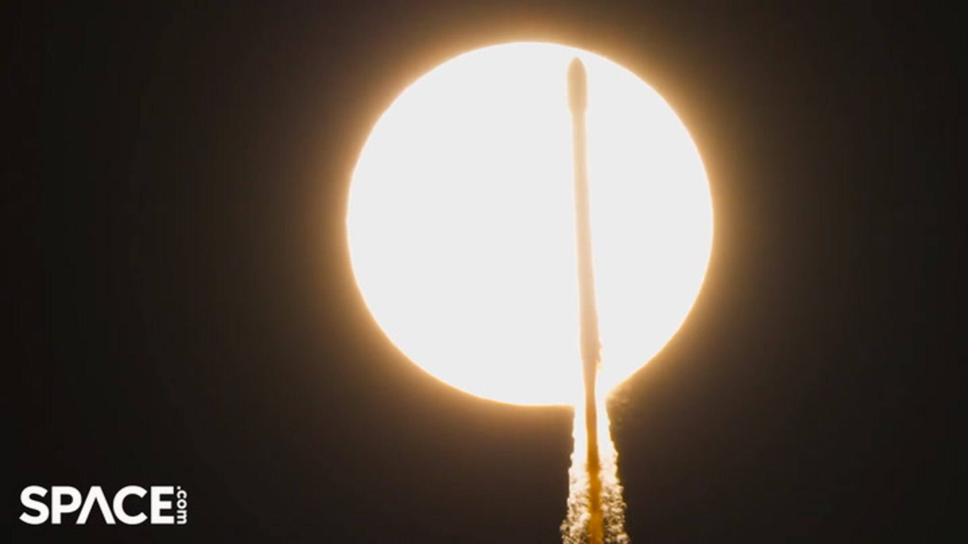 Spectacular slow-mo: SpaceX rocket silhouetted against the sun