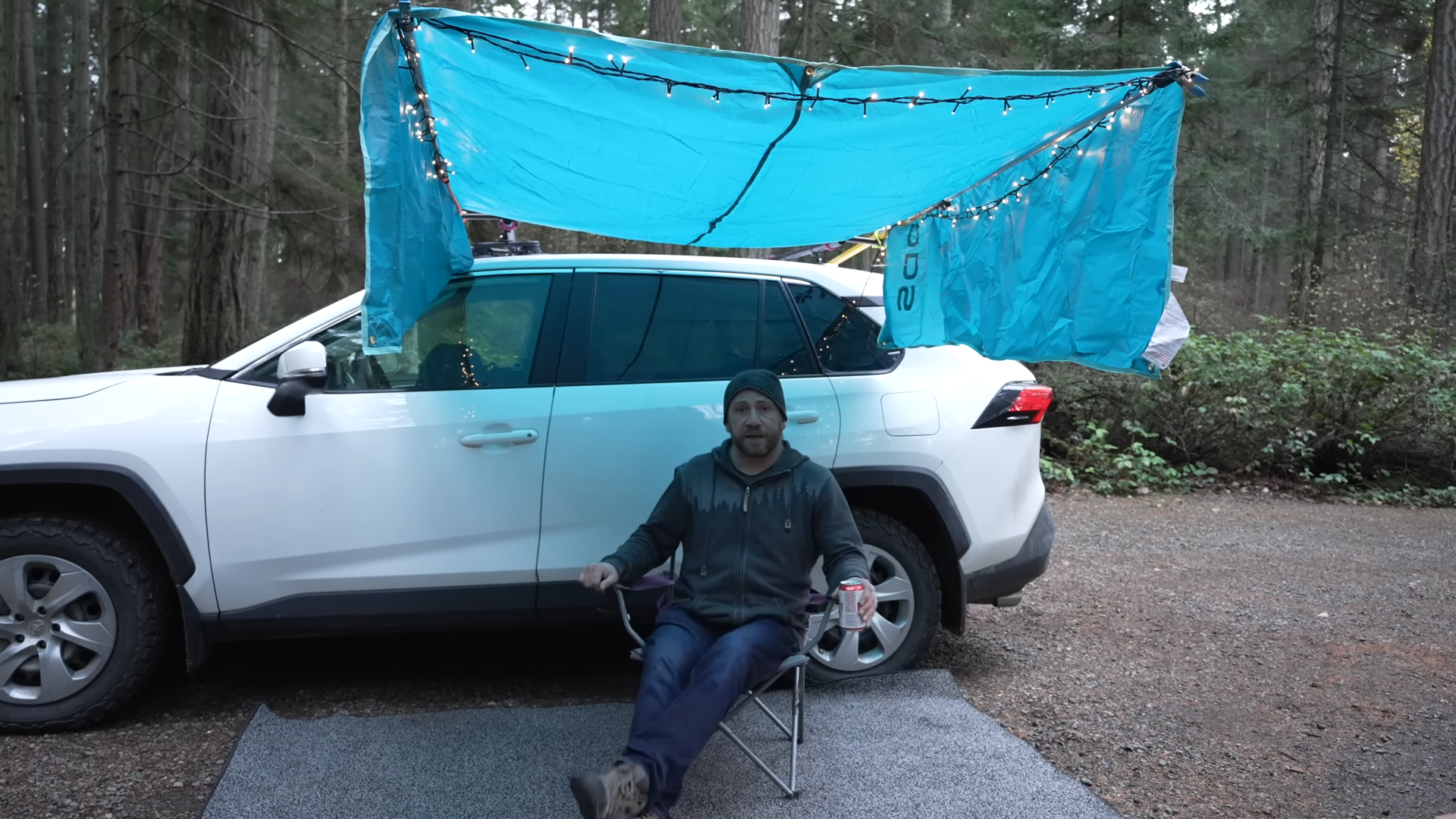 He built a DIY SUV canopy using shower curtain rods