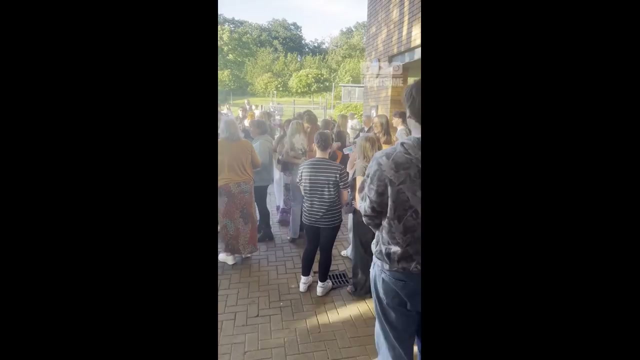 The sister reacts with pure joy when she finally hugs her brother again