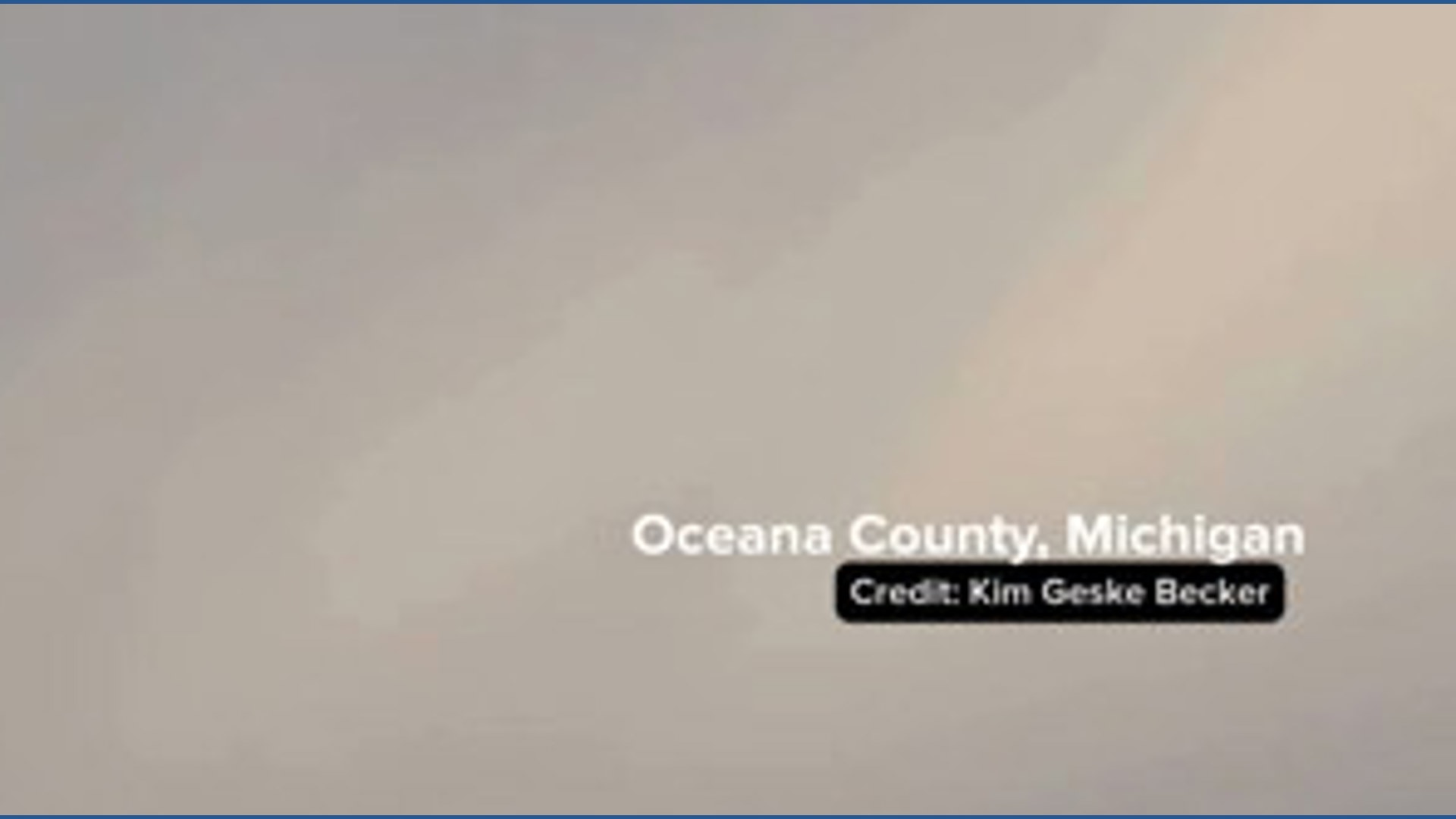 Funnel cloud forms on Lake Michigan near Little Sable Lighthouse