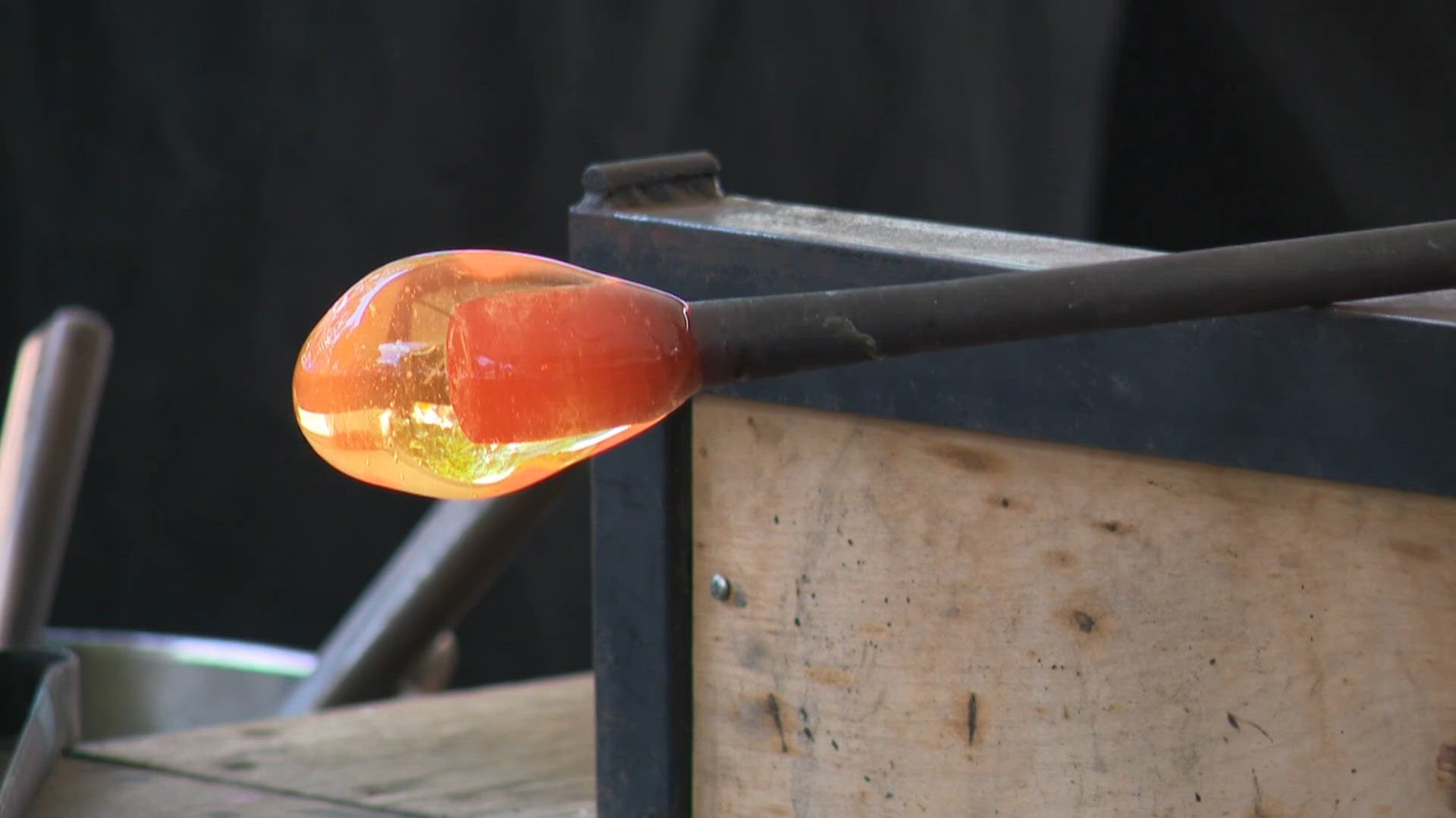 Fairgoers witness hot glass transform