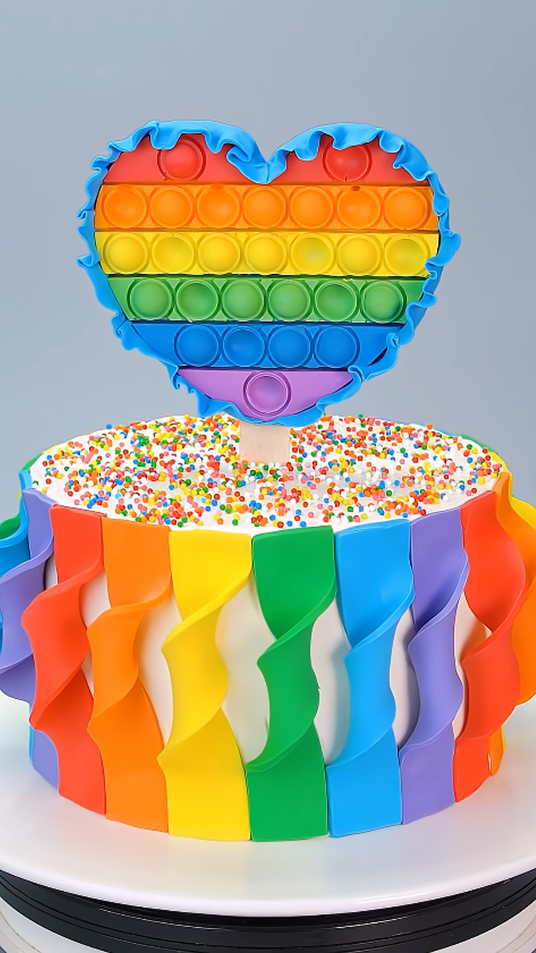 How to decorate a vibrant rainbow fondant cake