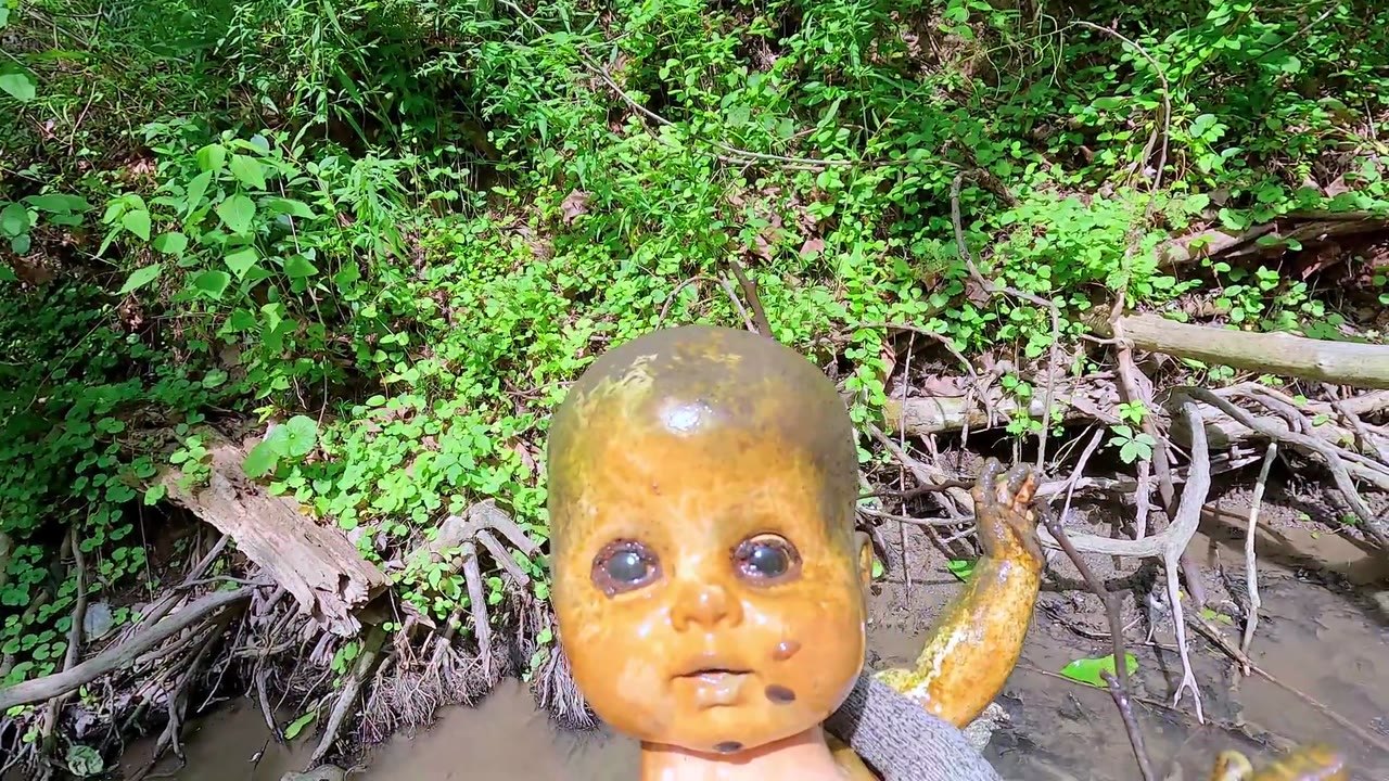 They found a creepy baby doll in the water - moments later, screams ...