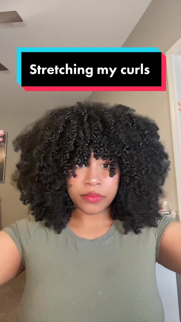 Stretching natural curls with a blow dryer technique