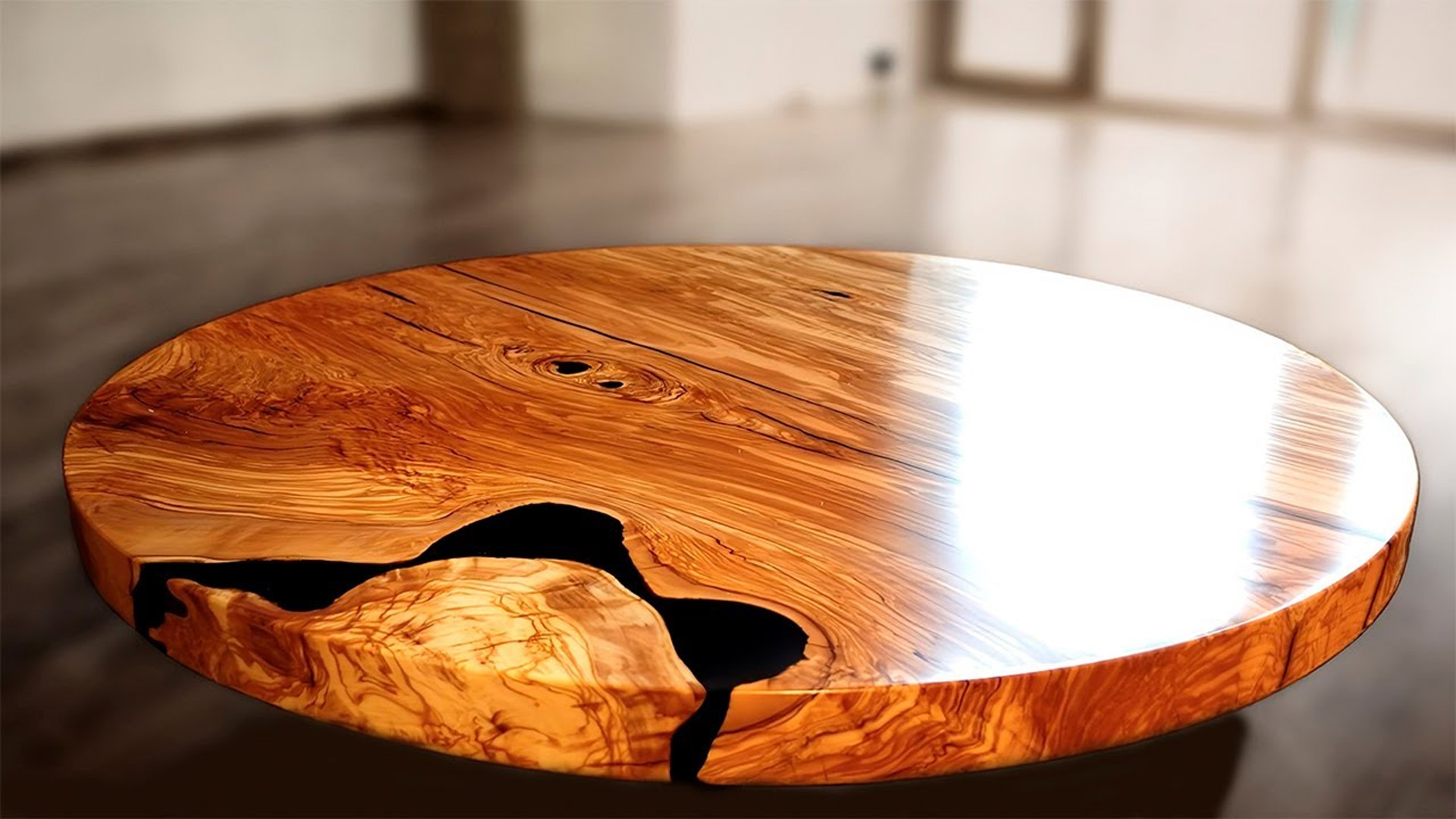 1000-year-old wood slab becomes a round epoxy table