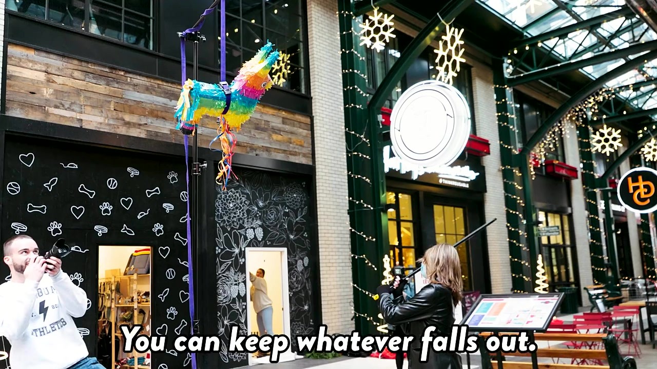 Nick Symmonds fills a piñata and challenges strangers to break it open