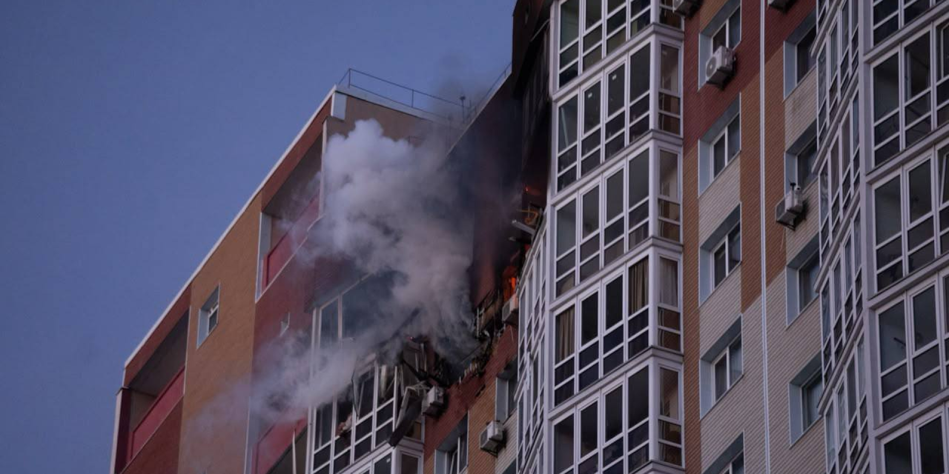 Photos show devastating aftermath of Russian drone strike on Kyiv high-rise