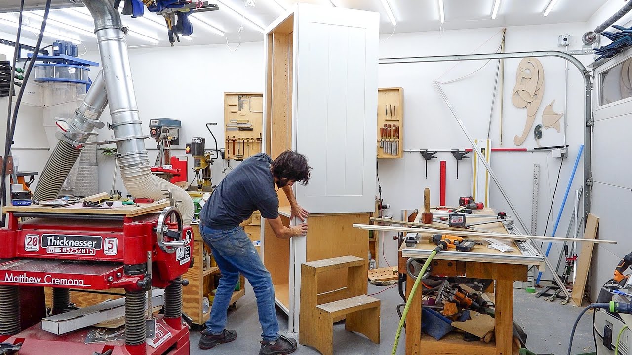 Appliance garage with HVLP spray