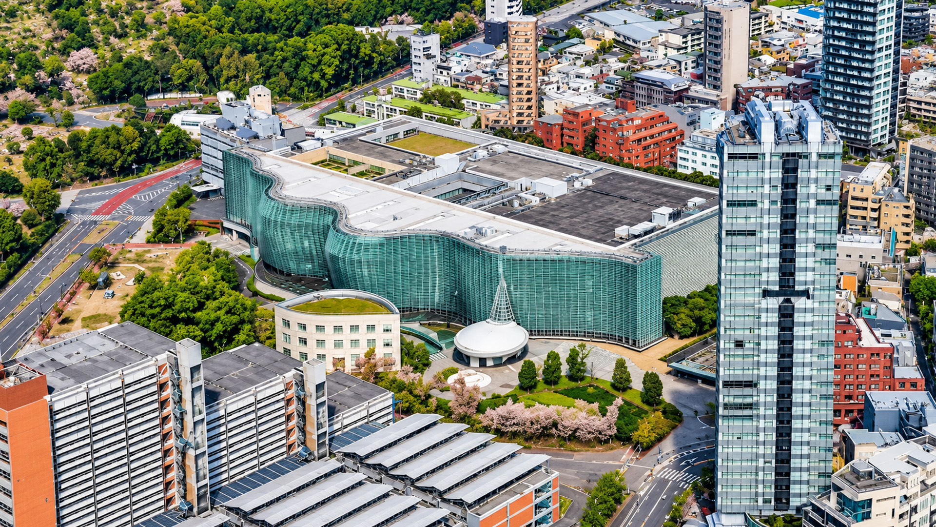 Tokyo’s Roppongi district changes around this curved glass museum