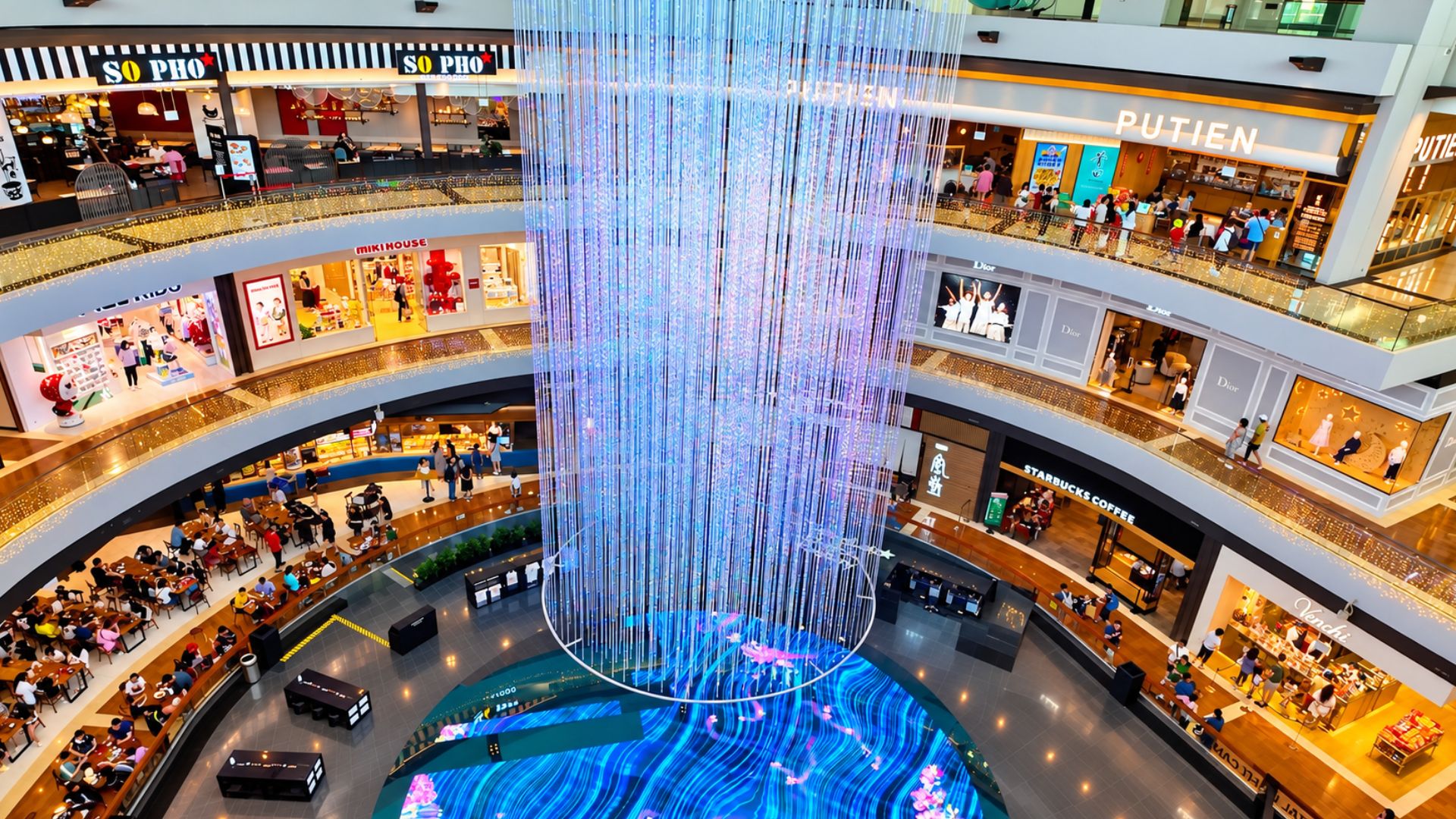 Inside Singapore's Marina Bay Sands mall and its glowing waterfall (4K)