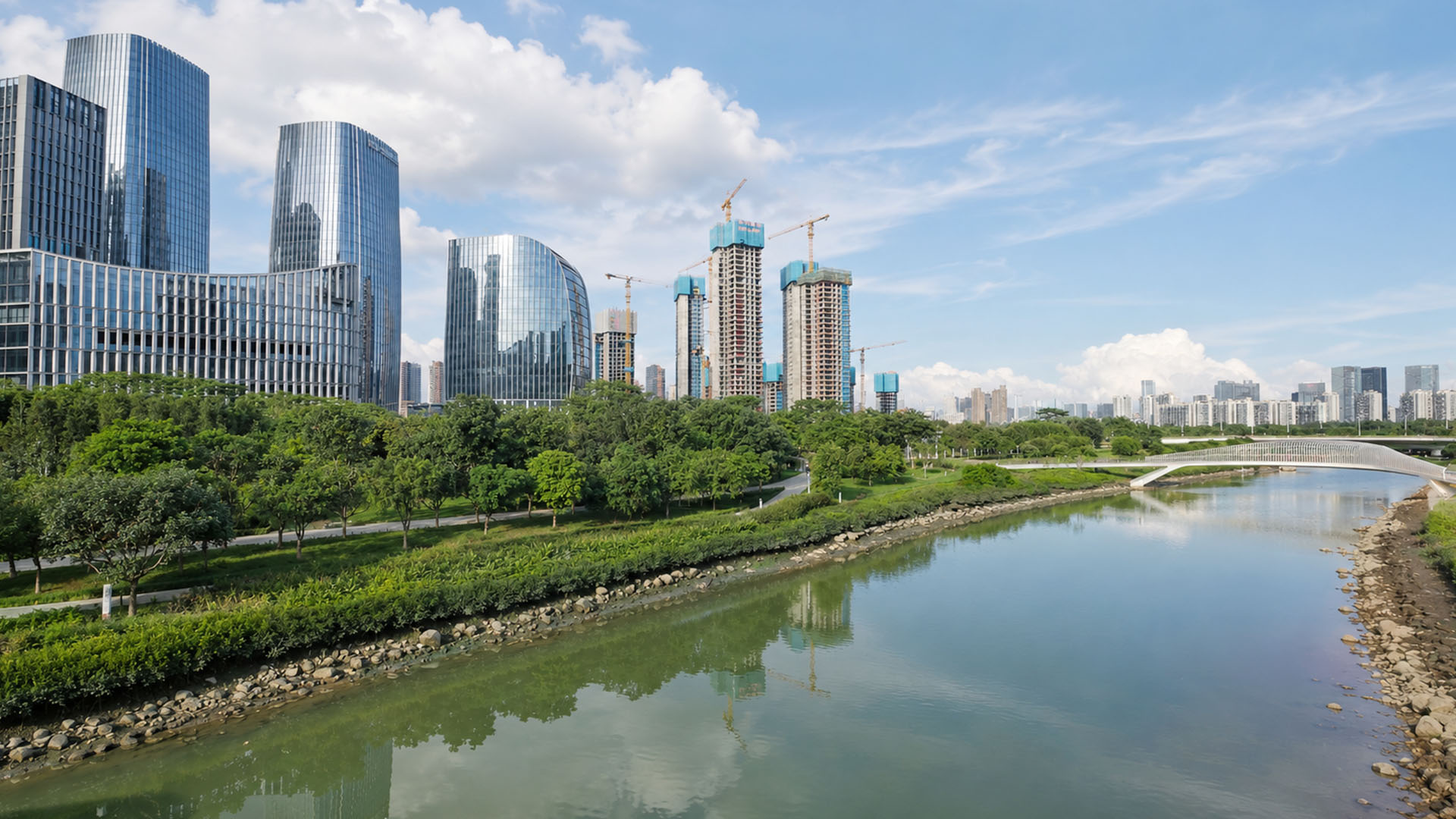 China’s riverfront skyline mixes glass towers and new construction
