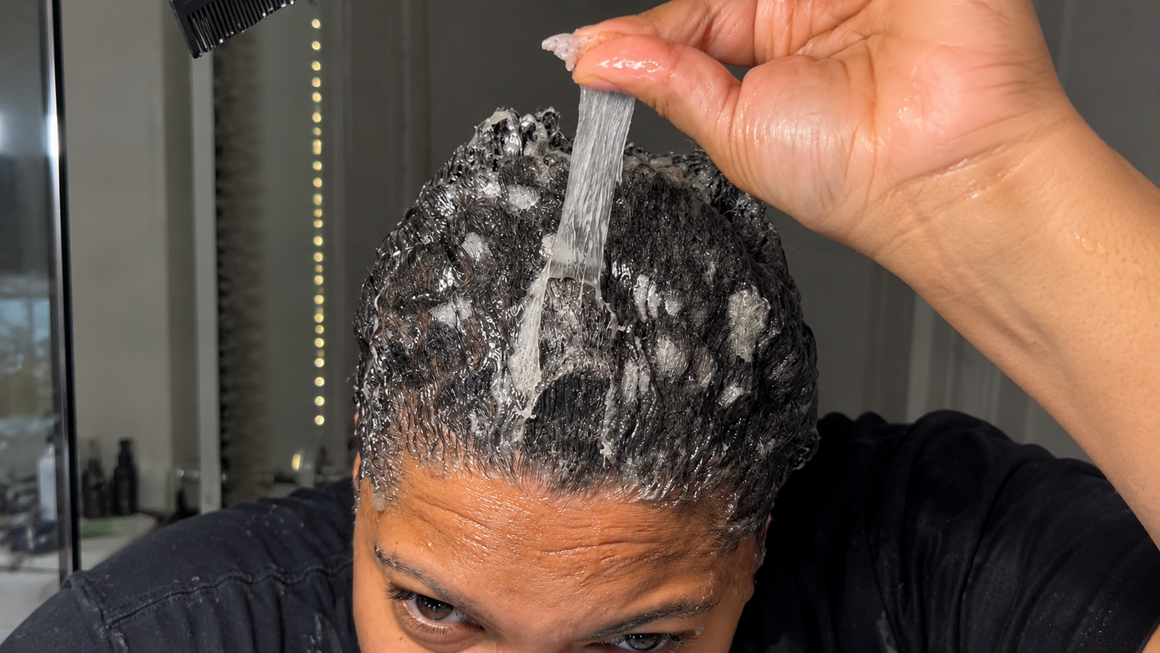 Woman uses hair glue to style her hair - but it gets stuck