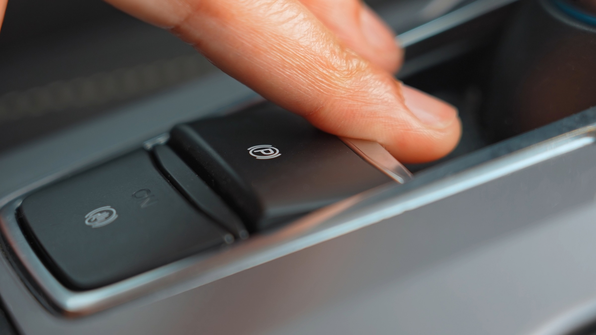 Owners of cars with a parking brake button may be in for an expensive ...