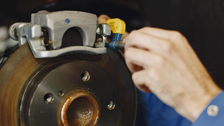 Owners of cars with a parking brake button may be in for an expensive ...
