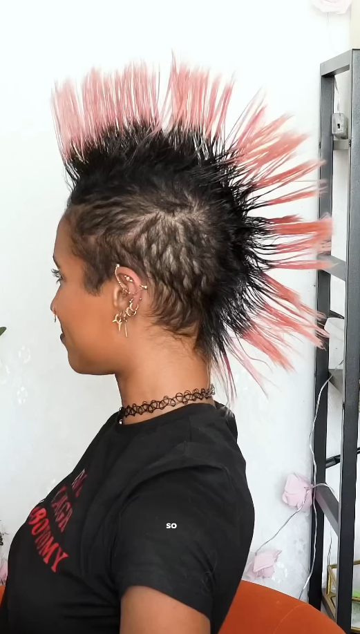 Curly hair styling techniques for a spiky mohawk