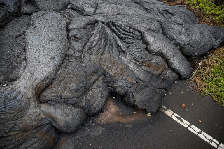 Fast lava from Hawaii's Kilauea volcano closes highway