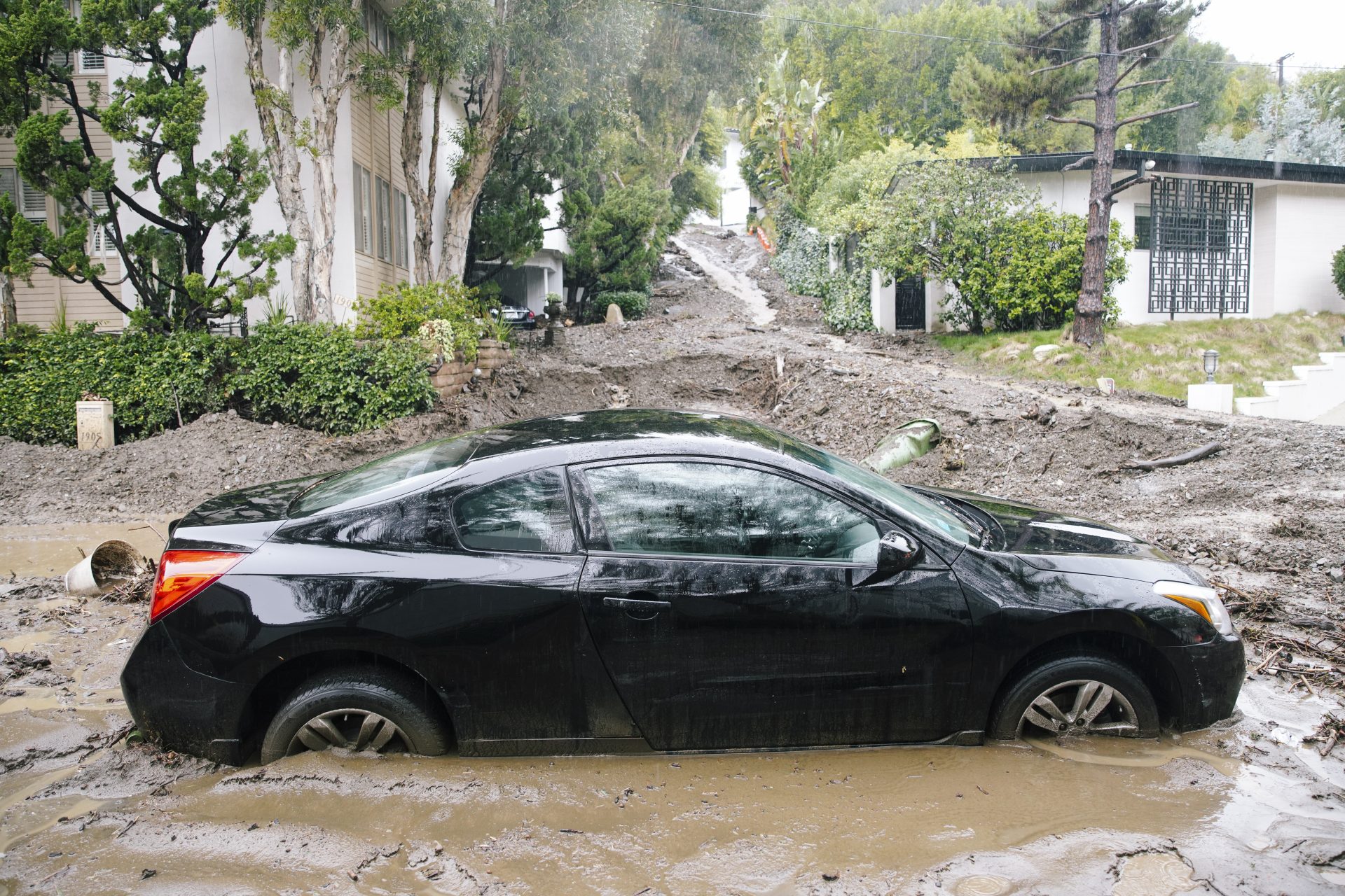 In pictures: extraordinary rainfall causes flooding and landslides in ...