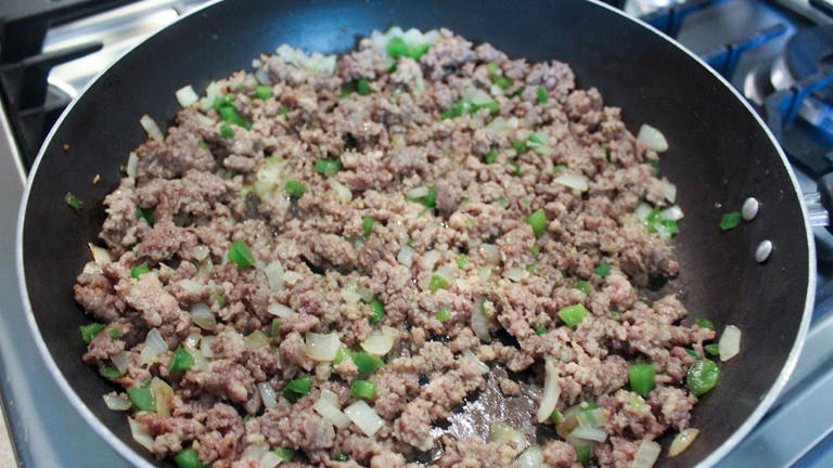 Browning sausage gives these baked beans a wonderful extra punch of ...