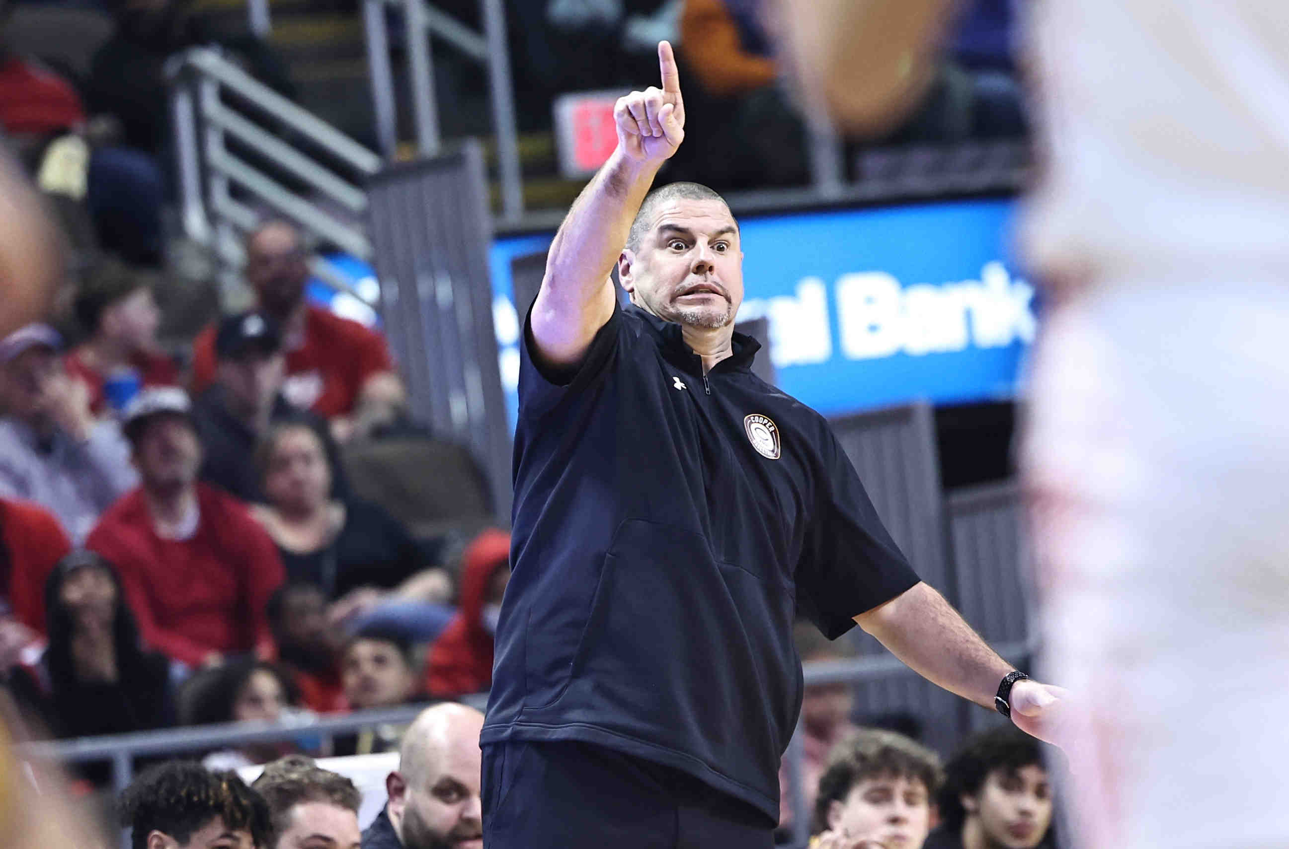 Cooper boys basketball coach Tim Sullivan is fighting ouster, wife says