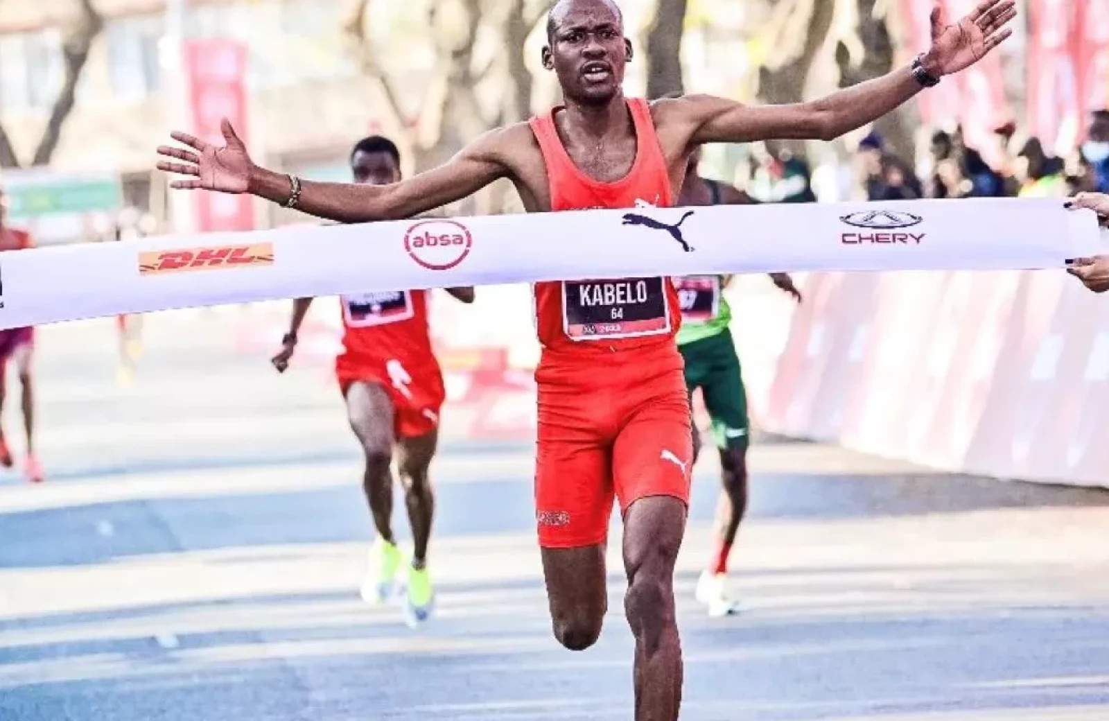 Kabelo Mulaudzi claims victory in the Absa Run Your City 10km race for ...