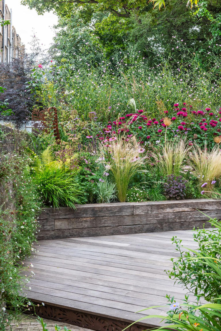 This style of garden design actually boosts your plants' health ...