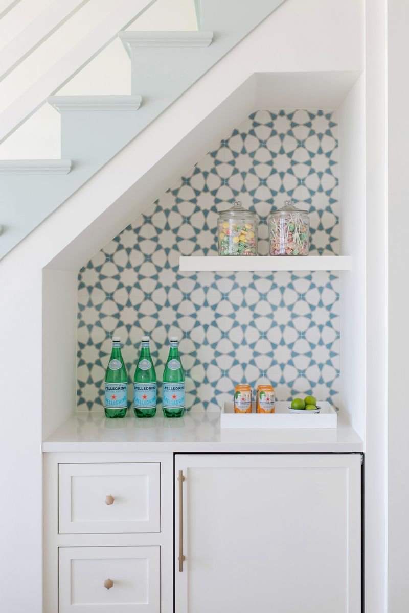 Designers say these under-stair ideas maximize small spaces