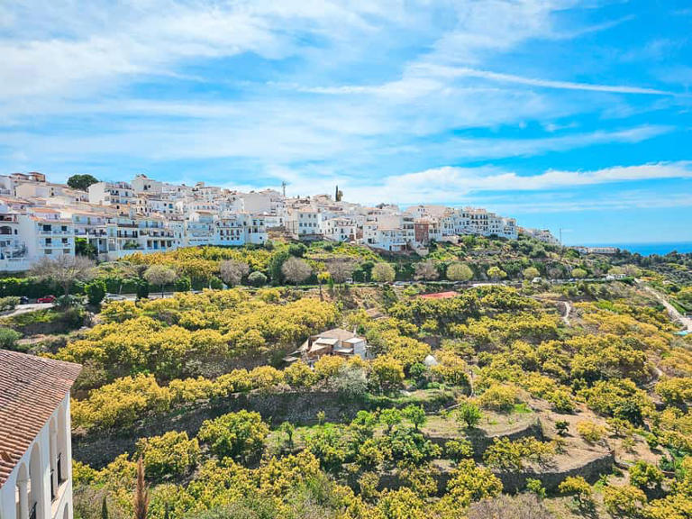 This Whitewashed Village Is Called the Prettiest in Spain—And It’s Easy ...
