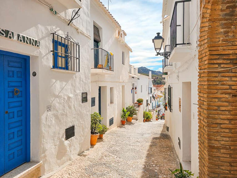 This Whitewashed Village Is Called the Prettiest in Spain—And It’s Easy ...