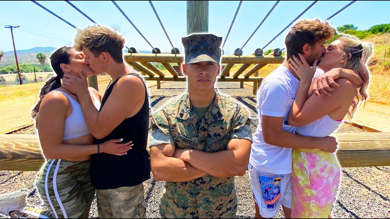 Couples compete in a challenging military obstacle course