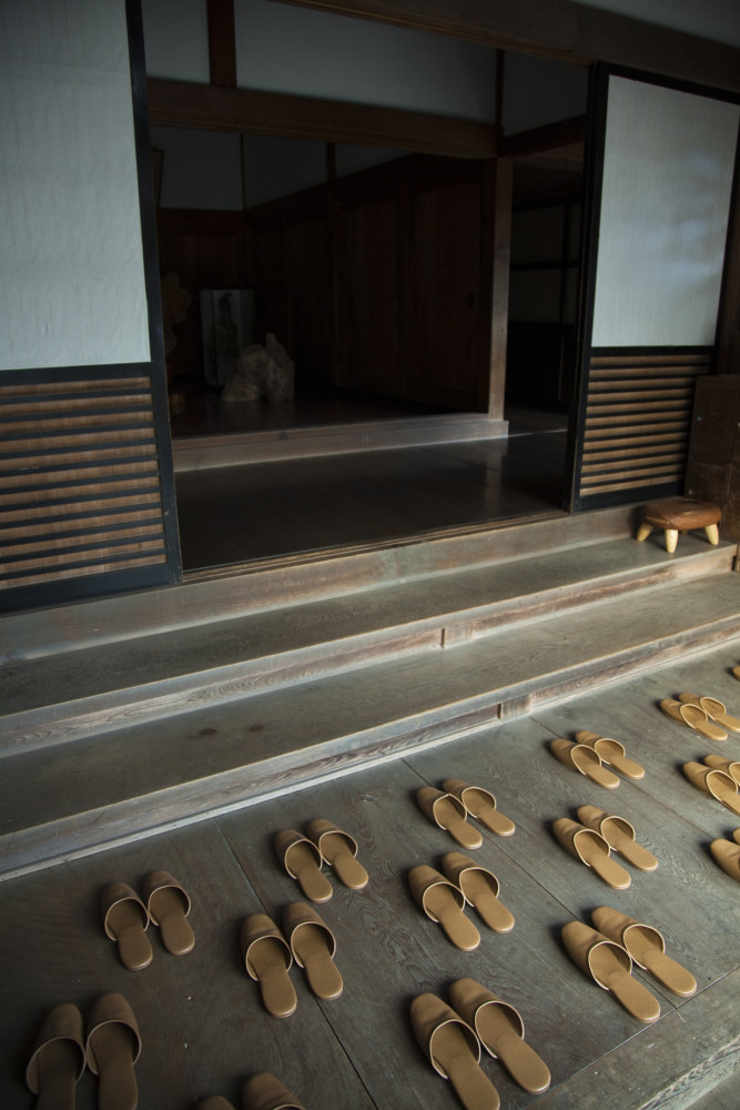 When did we begin to wear slippers, and why?