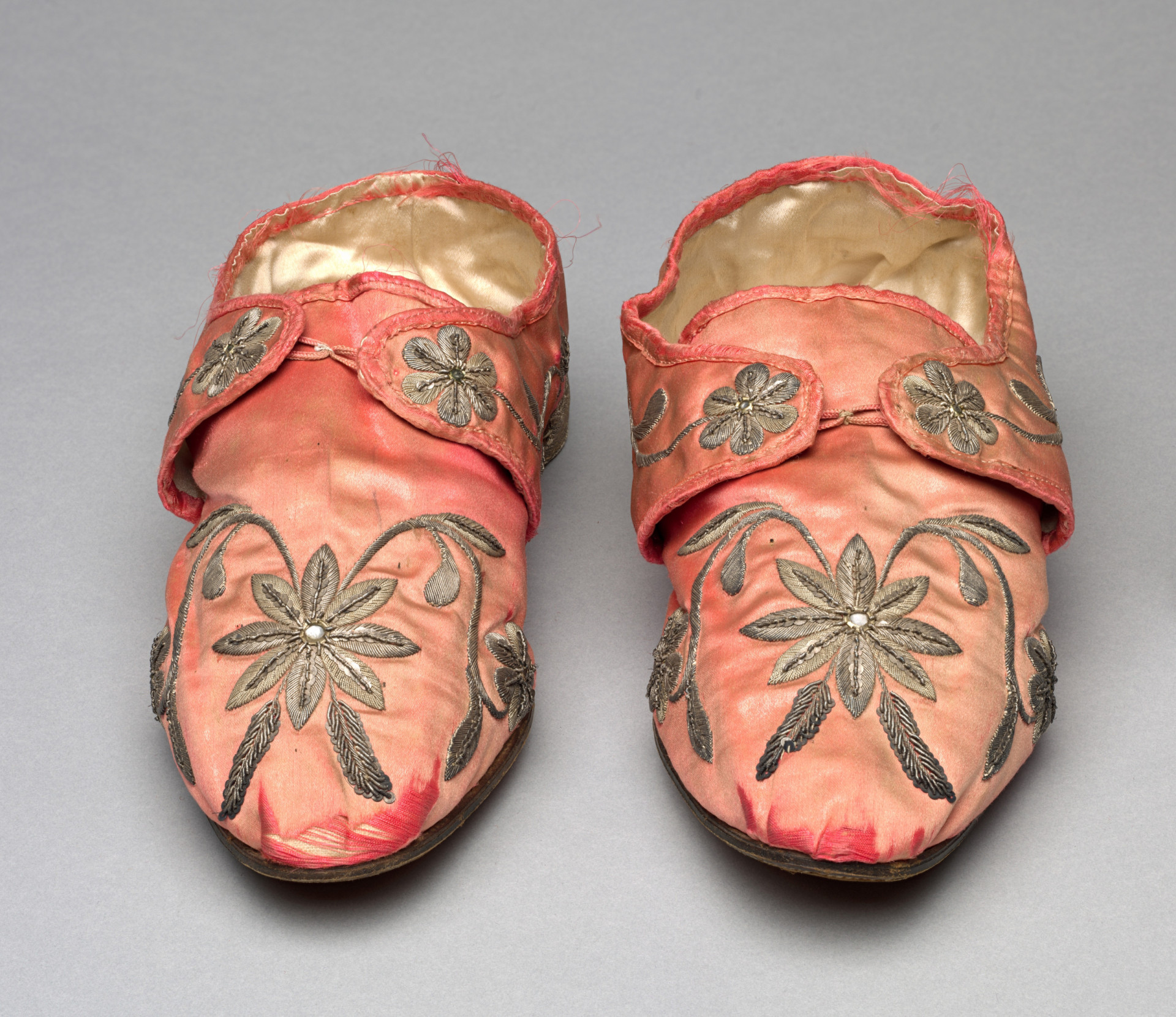 When did we begin to wear slippers, and why?