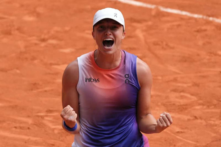 Clay queen Swiatek routs Paolini for fourth French Open title Clay queen Swiatek routs Paolini for fourth French Open title