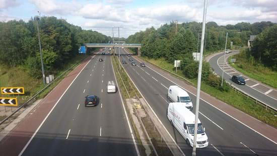 Motorbike crash on M56 shuts two lanes and causes 45 minute traffic delays