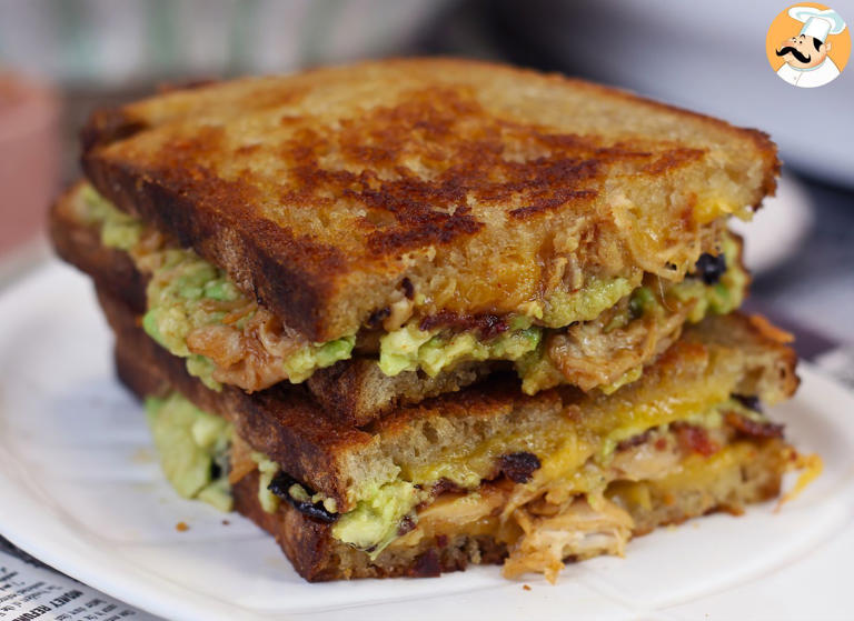 Maxi grilled cheese sandwich: cheddar, shredded chicken, avocado, bacon