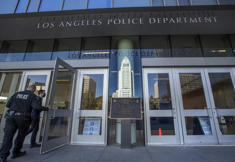 LAPD officer hit in ballistic vest, suspect wounded as shots exchanged ...