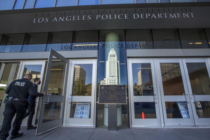 LAPD officer hit in ballistic vest, suspect wounded as shots exchanged ...