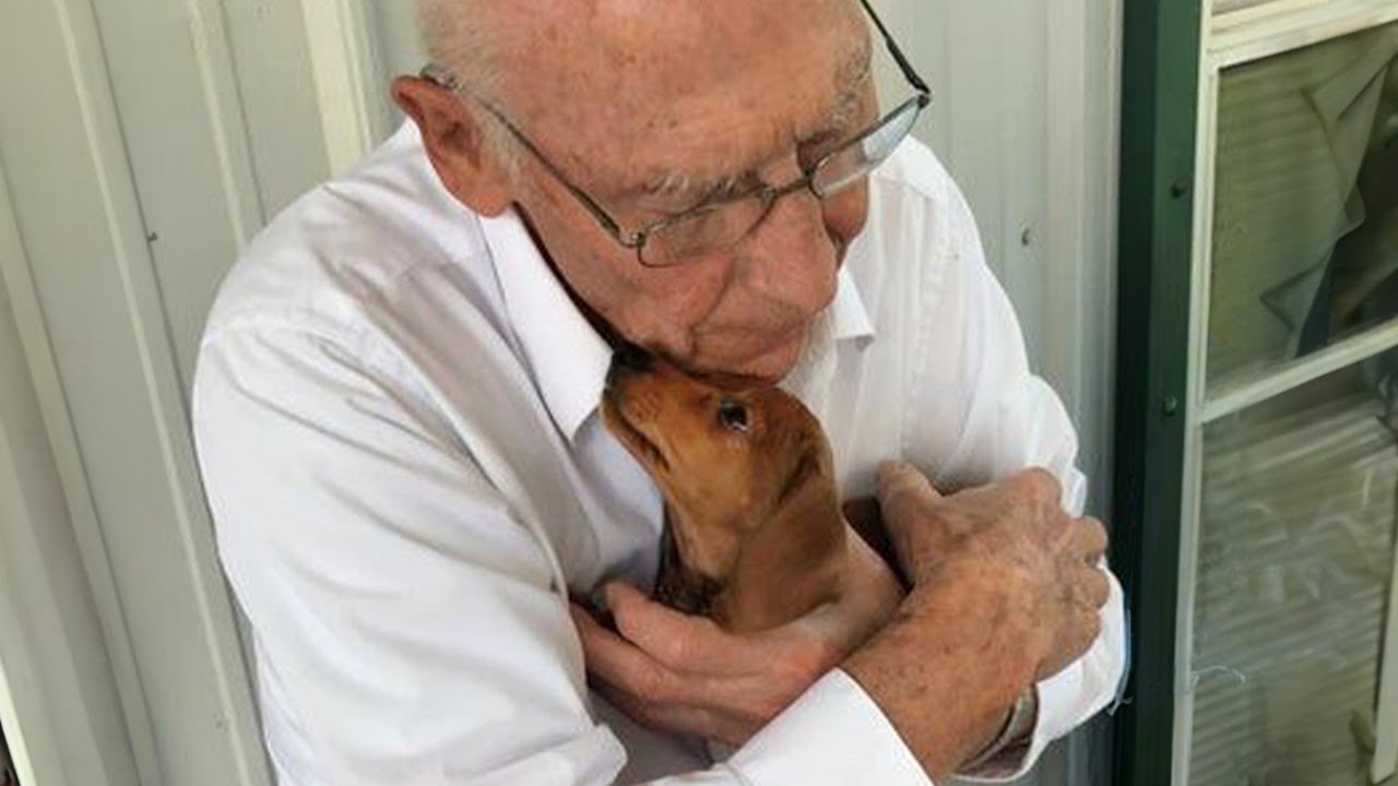 A man’s joy as he meets his new puppy best friend for the first time