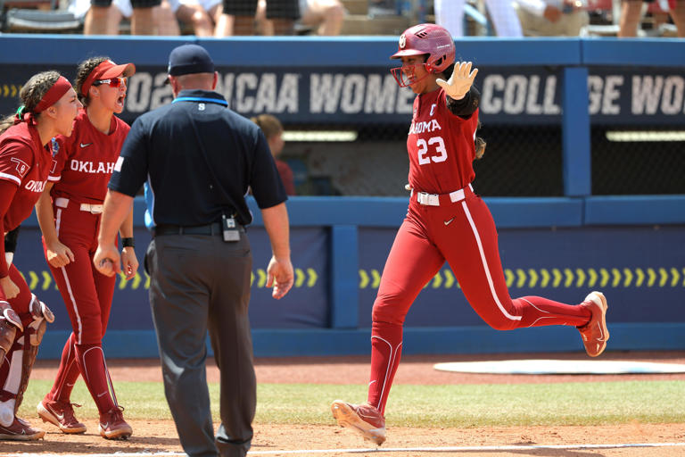 Why do ushers return home run balls at WCWS? Explaining college ...