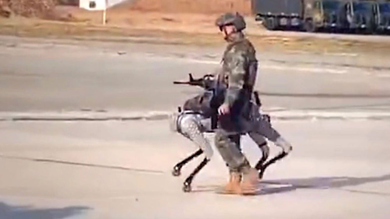 China's military unveils machine gun-wielding robot 'war hounds' China's military unveils machine gun-wielding robot 'war hounds'