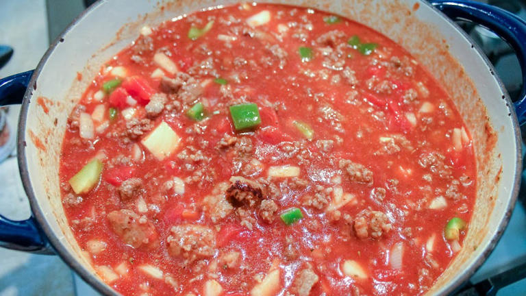 As this old-fashioned spaghetti sauce simmers on your stove all day it ...