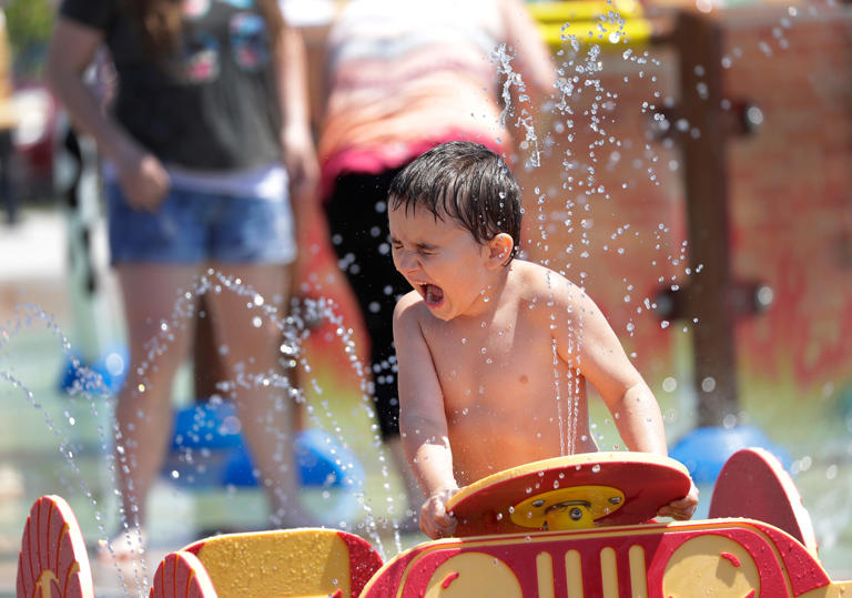 This Neenah playground with a firefighter splash pad helps kids beat ...